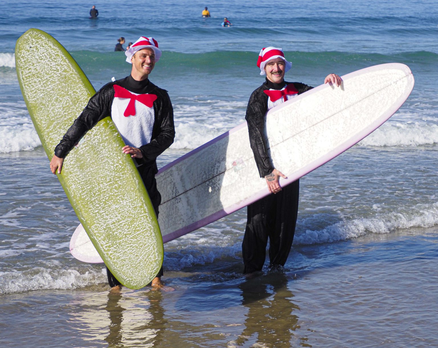 More Than 100 Costumed Surfers Rode the Waves for the Annual Blackies ...