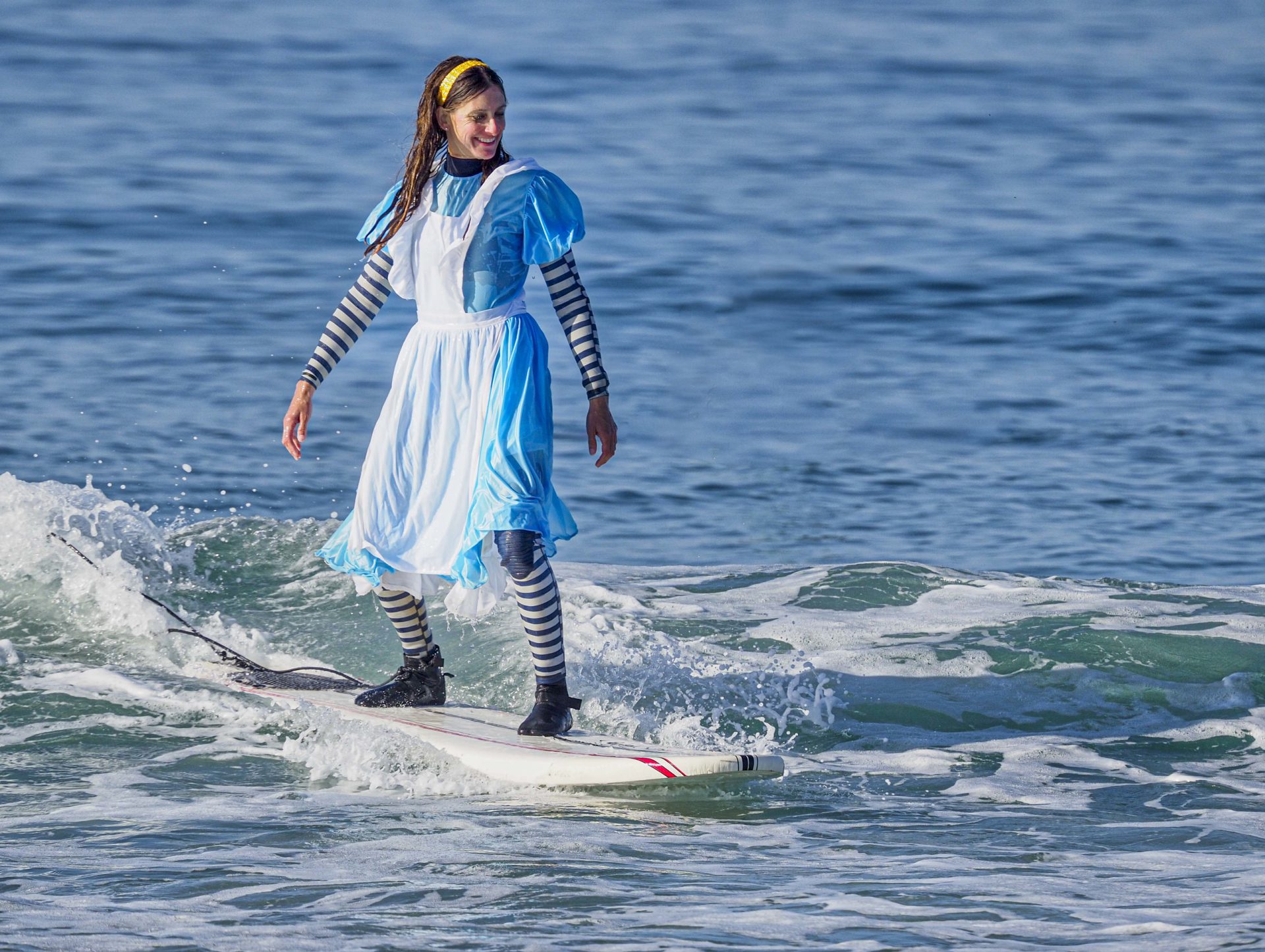 More Than 100 Costumed Surfers Rode the Waves for the Annual Blackies ...