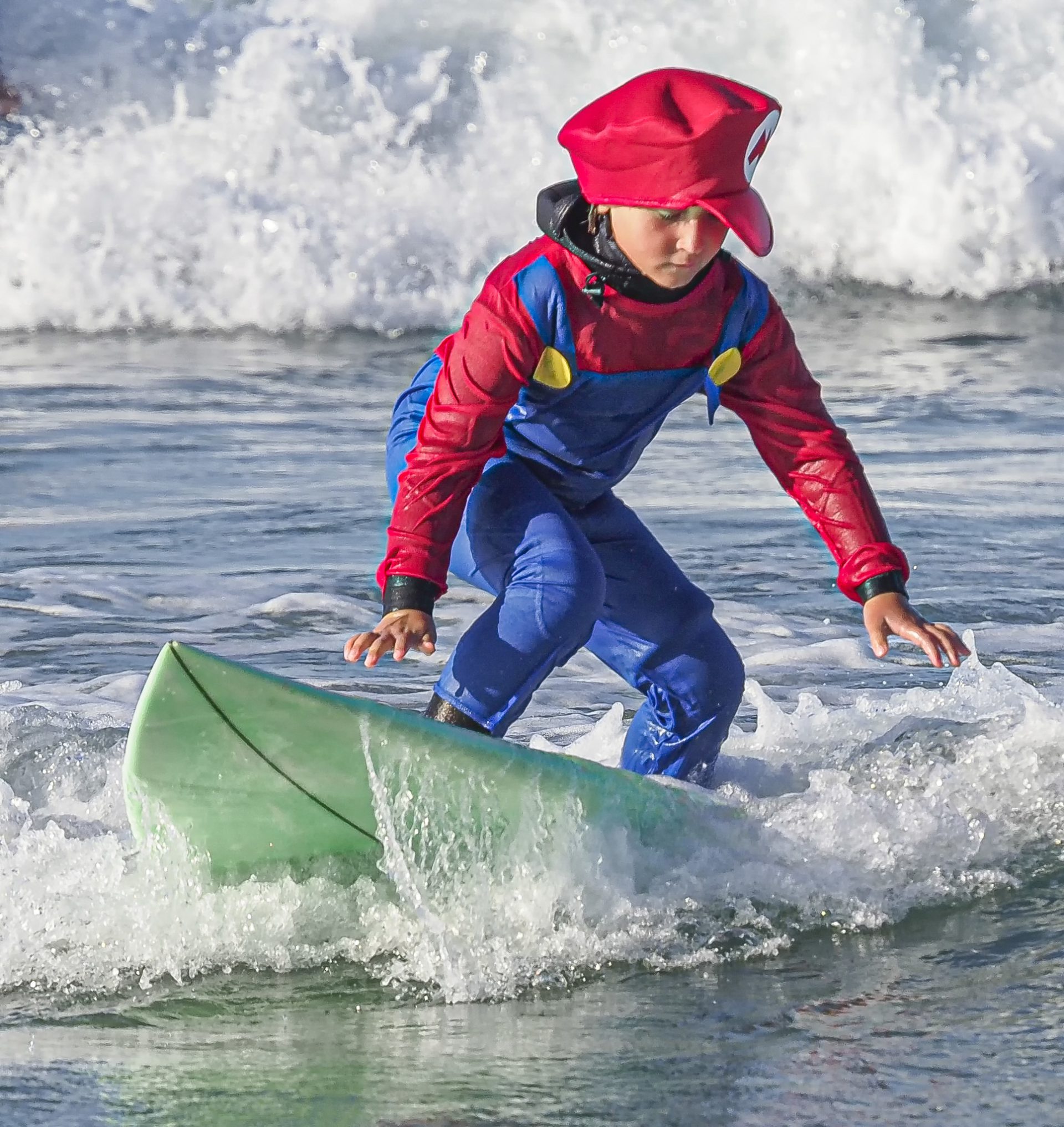 More Than 100 Costumed Surfers Rode the Waves for the Annual Blackies ...
