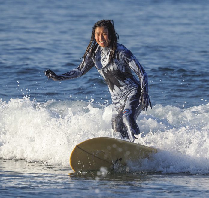 More Than 100 Costumed Surfers Rode the Waves for the Annual Blackies ...